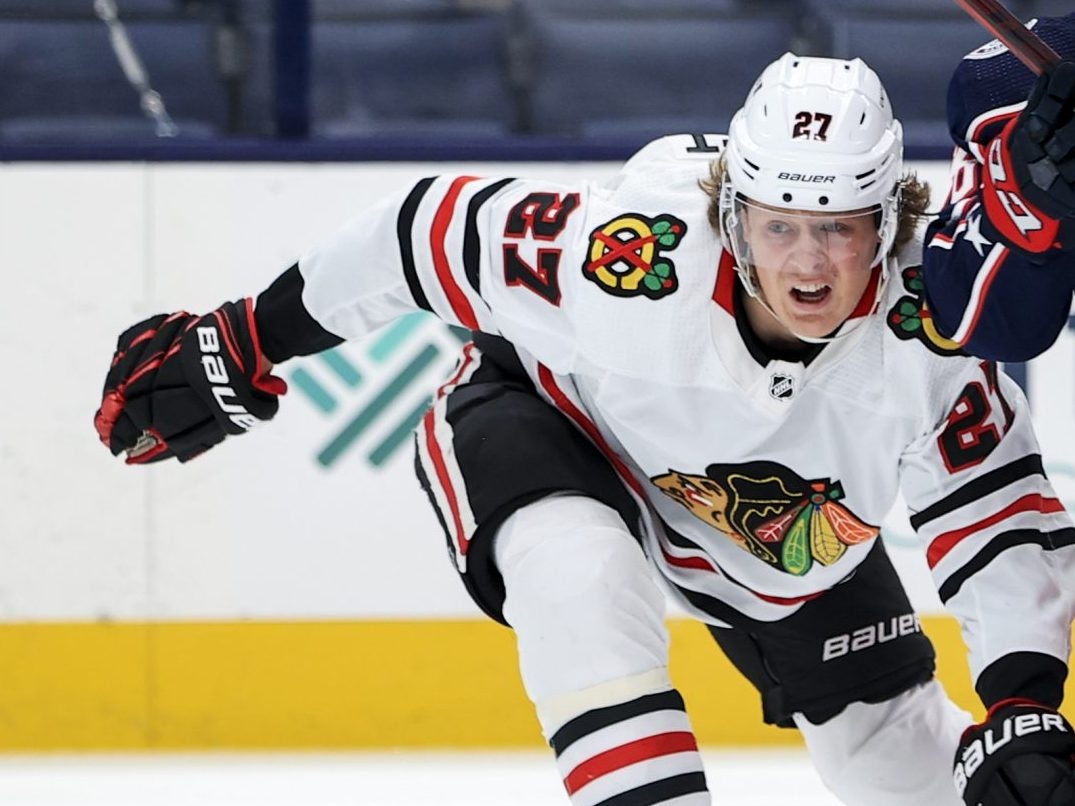 Blackhawks' Adam Boqvist hit in face by puck, leaves game | Toronto Sun