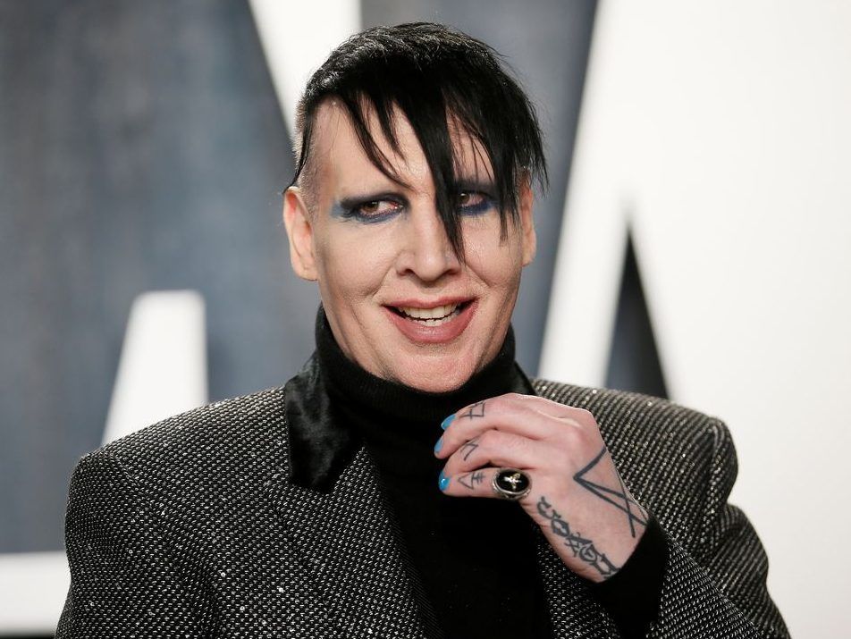 Arrest warrant issued for singer Marilyn Manson on assault charges in ...