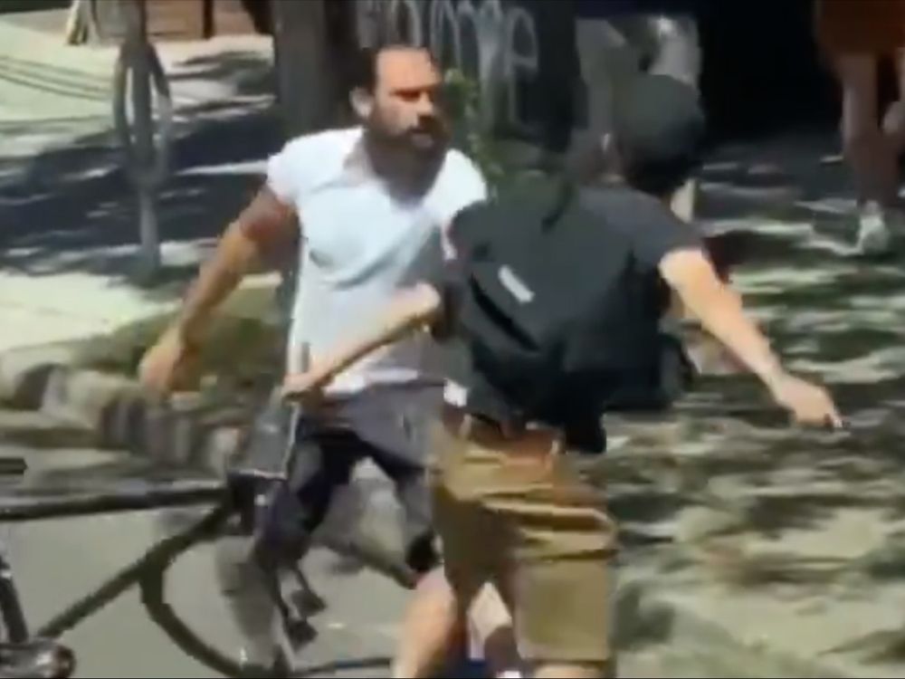 ROAD RAGE: Driver and cyclist duke it out in Toronto intersection ...