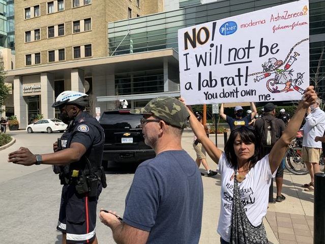Protest rally outside Toronto General Hospital draws criticism ...