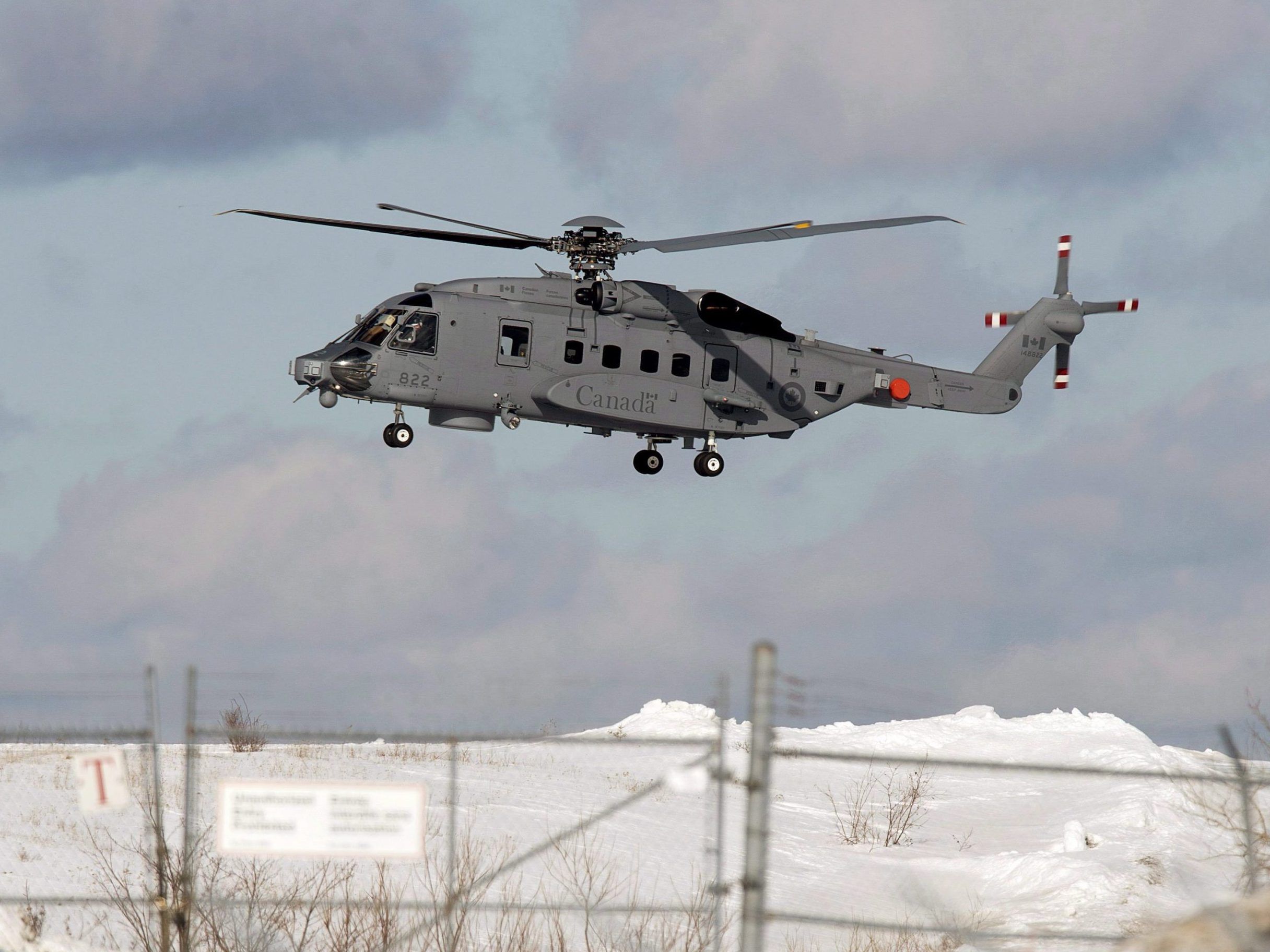 Military repairing cracks in the tails of some CH-148 Cyclone maritime ...