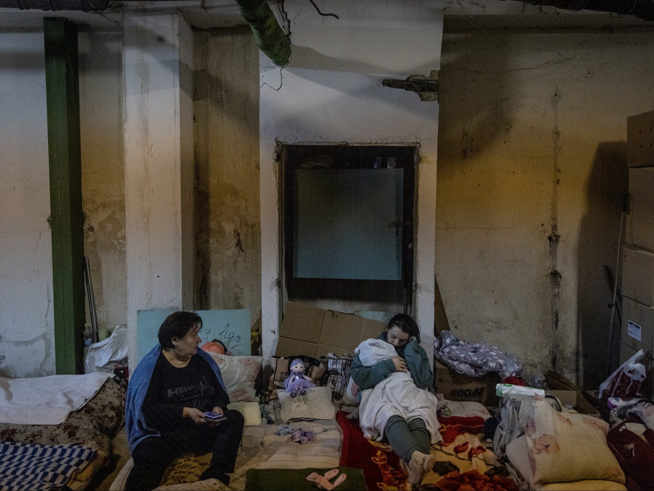 Ukrainian mother shielded baby from shrapnel blasts as civilian toll ...