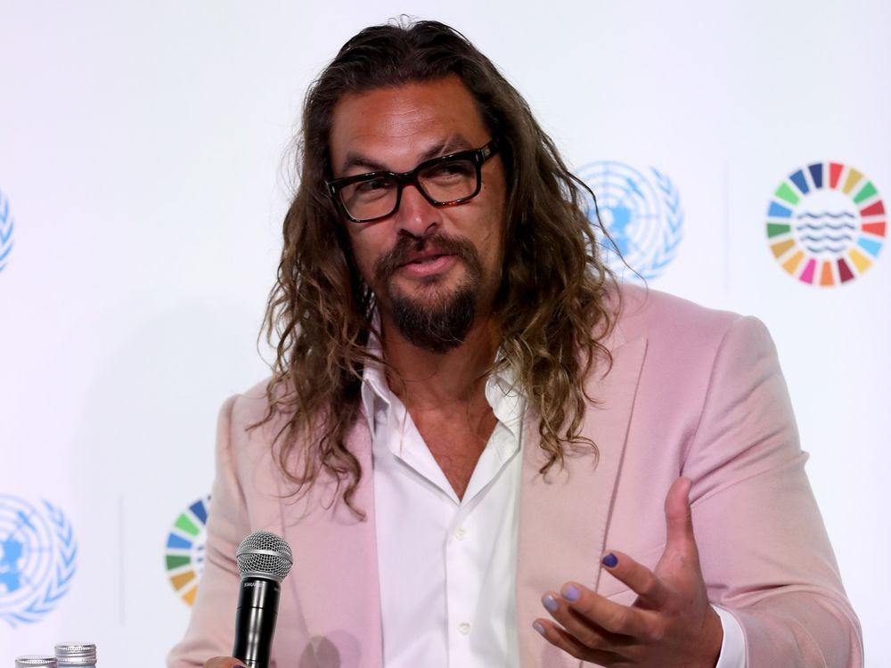 AGUAMAN?: Jason Momoa poses as flight attendant, hands out water ...