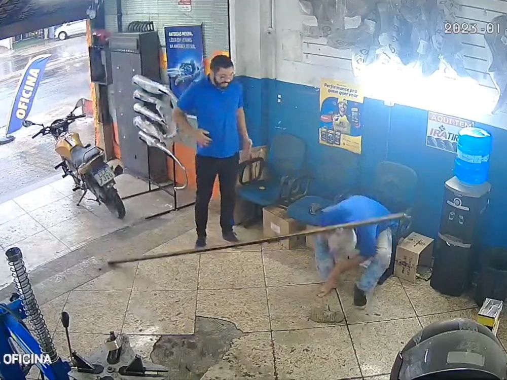 CAUGHT ON CAMERA: Ouch! Man hit by metal bar twice in Brazil car shop ...