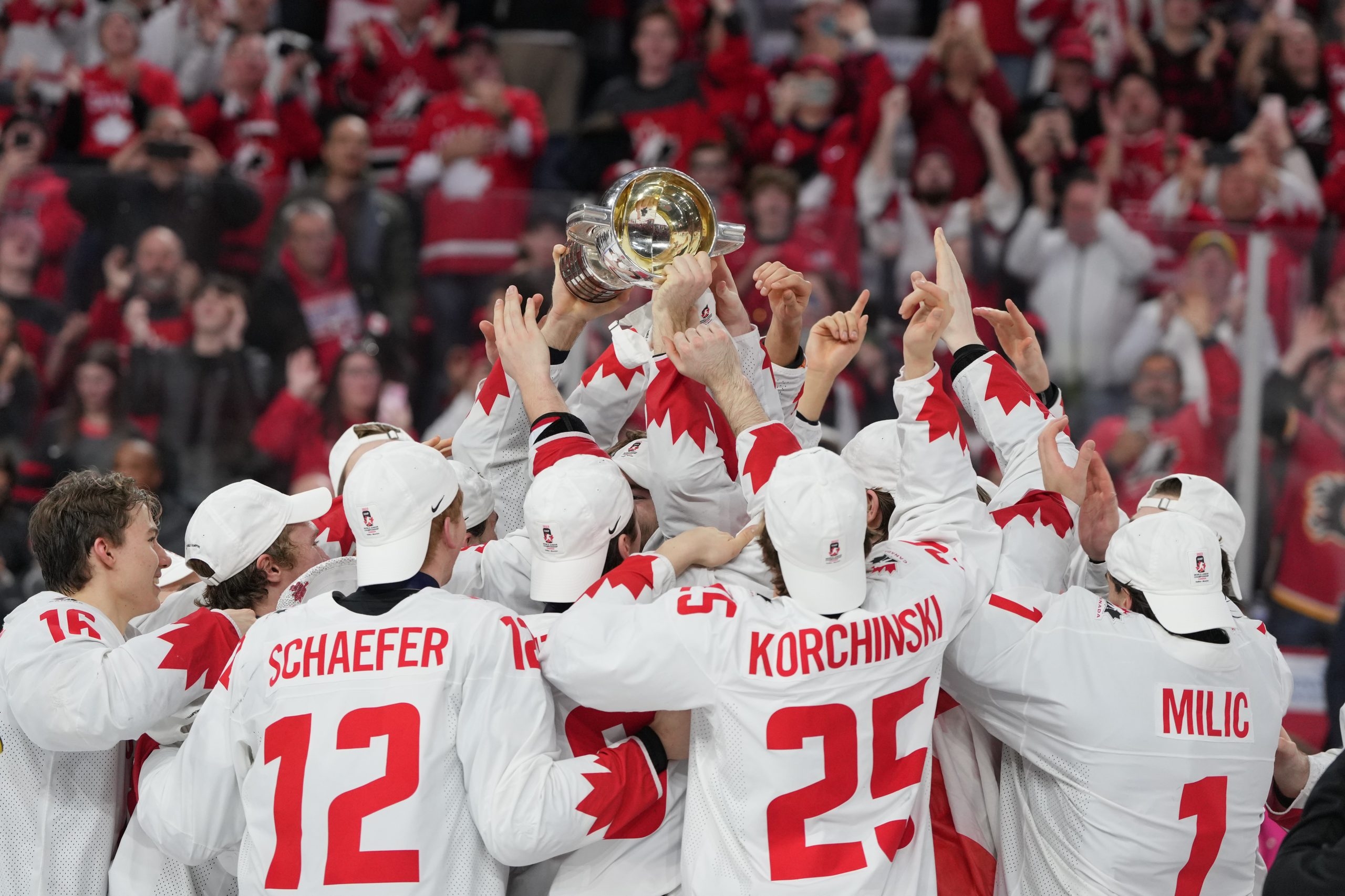Canada reclaims world junior crown on Dylan Guenther's overtime goal ...