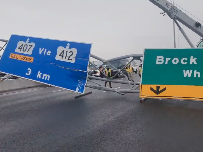 Transport truck with box up brings down Hwy. 401 signs in Whitby ...