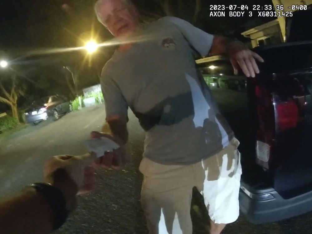 Body cam shows prosecutor offering cops business card in DUI arrest ...