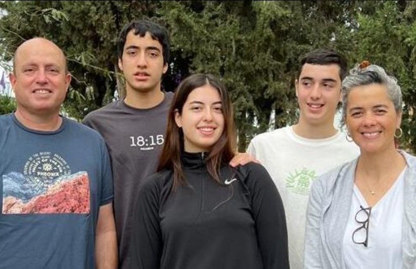 Israeli family of five found dead with father in protective embrace ...