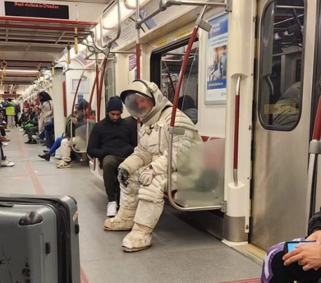 GIVE HIM SOME SPACE: Photo shows person dressed as astronaut on subway ...