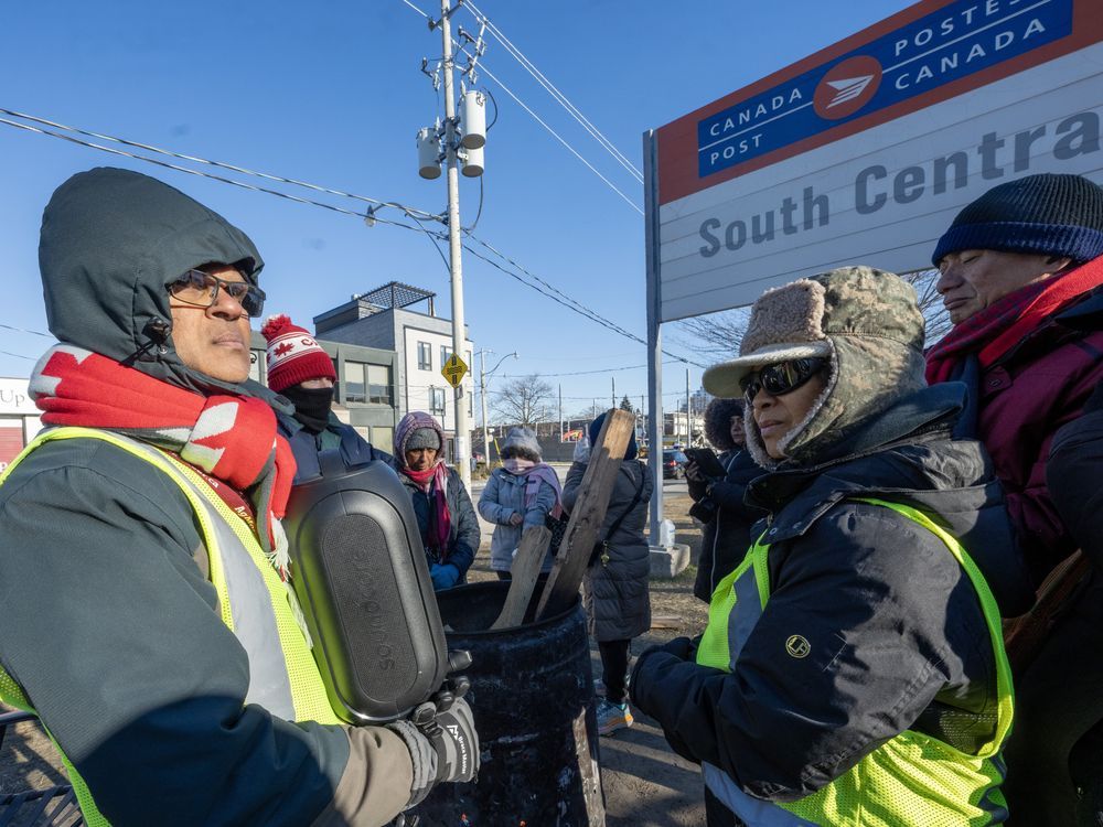 Postal workers on picket line react as Ottawa moves to end strike ...