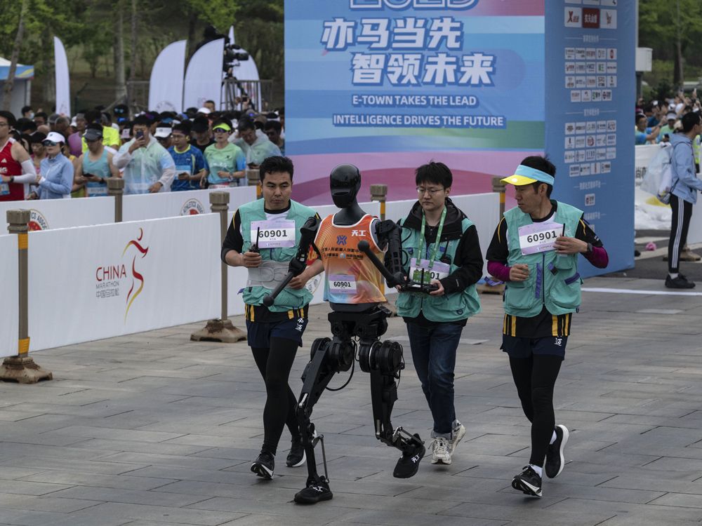 Humanoid robots run Chinese half-marathon alongside humans | Toronto Sun