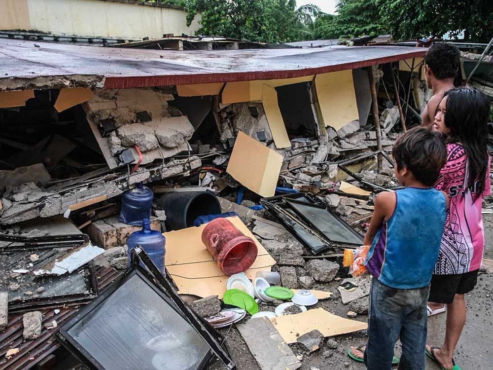 At least 69 killed in powerful earthquake hits the Philippines ...