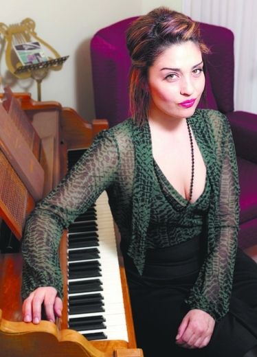 Ottawa`s Rebecca Noelle salutes her roots Sunday by launching her new ...