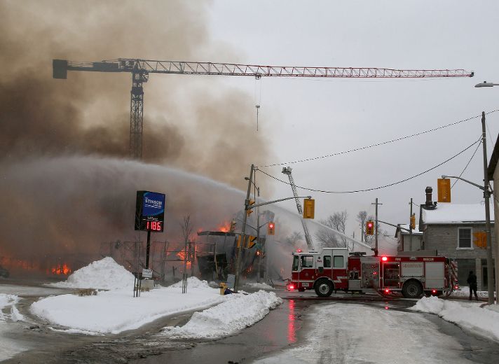 Stranded crane operator rescued from massive Kingston fire 'retires ...