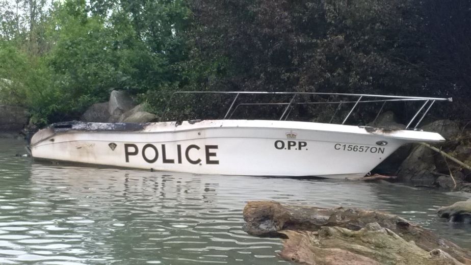 OPP patrol boat torched in harbour | Toronto Sun