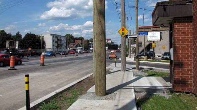 Hydro poles embedded in Montreal sidewalk | Toronto Sun