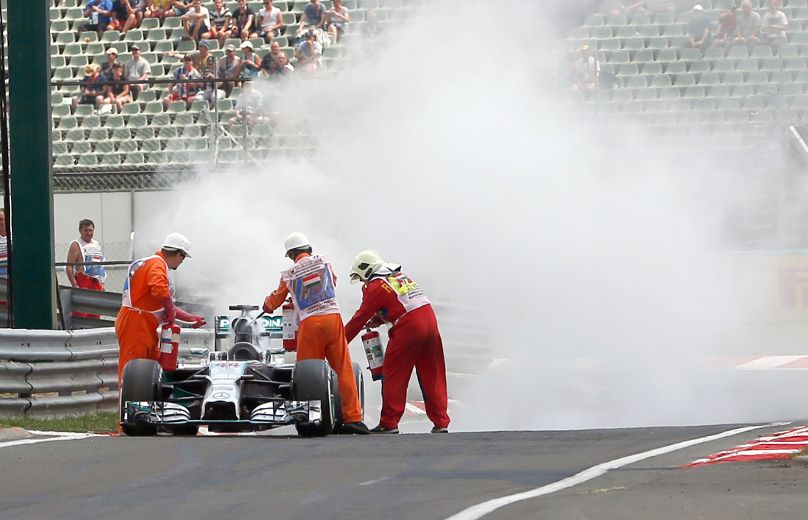 Lewis Hamilton literally on fire as Nico Rosberg grabs Hungarian GP ...