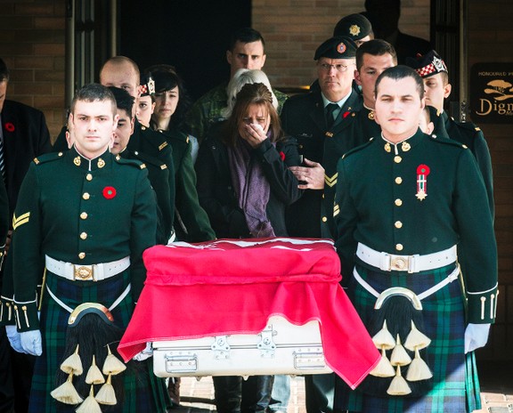 Hundreds line highway to pay respect to fallen soldier | Toronto Sun