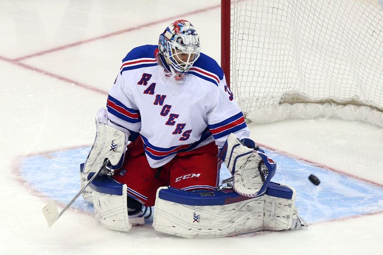 Oilers give up three late draft picks in trade for goaltender Cam ...