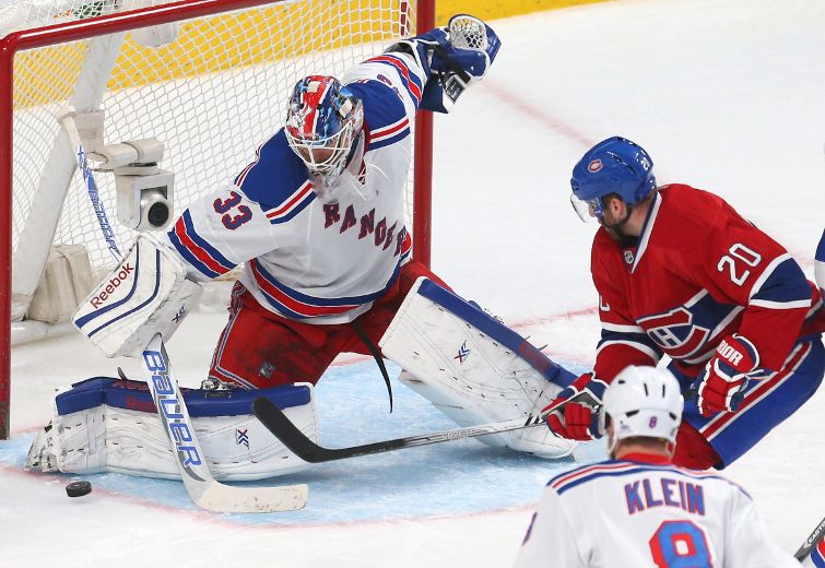 Oilers give up three late draft picks in trade for goaltender Cam ...