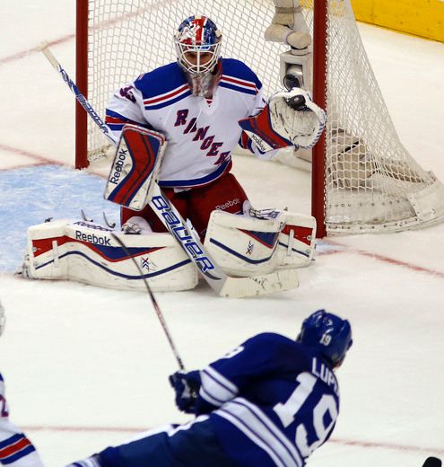 Oilers give up three late draft picks in trade for goaltender Cam ...