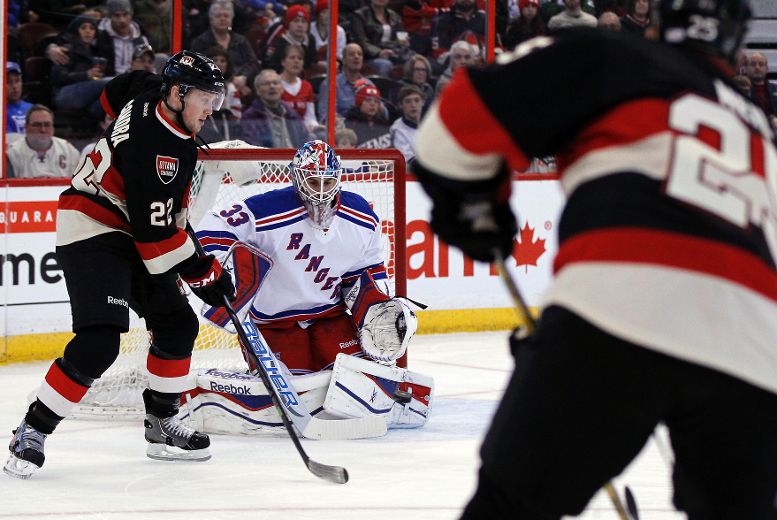 Oilers give up three late draft picks in trade for goaltender Cam ...