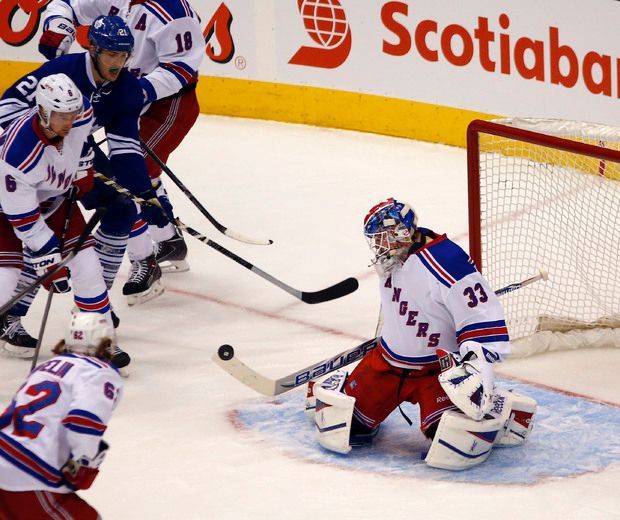 Oilers give up three late draft picks in trade for goaltender Cam ...