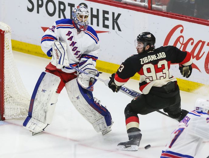 Oilers give up three late draft picks in trade for goaltender Cam ...