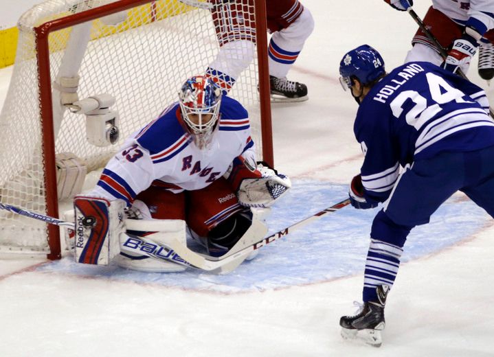 Oilers give up three late draft picks in trade for goaltender Cam ...
