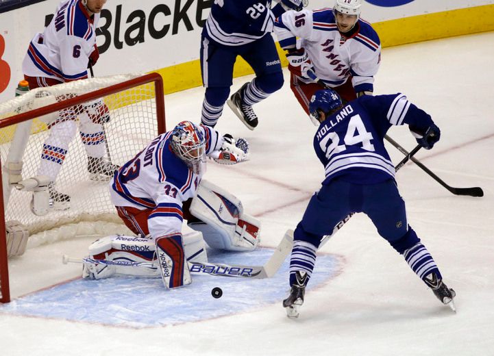 Oilers give up three late draft picks in trade for goaltender Cam ...