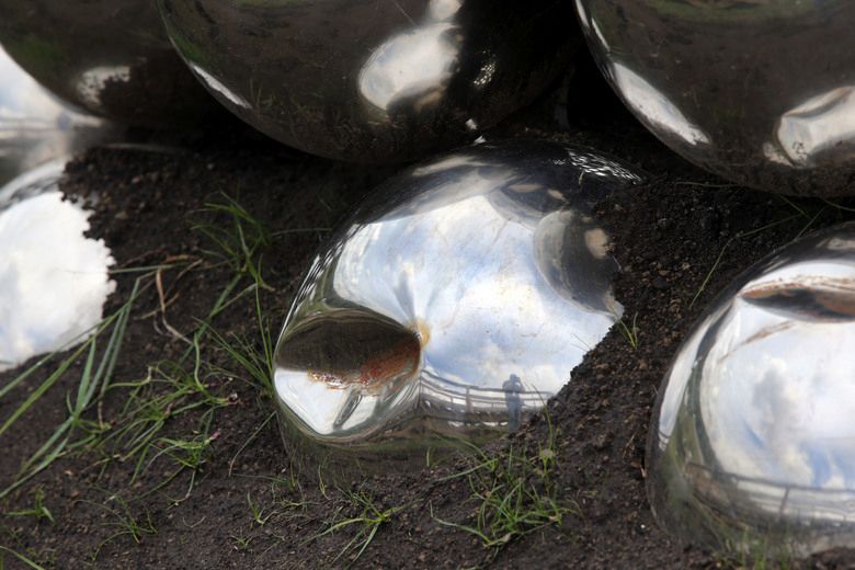 Vandals damage Edmonton's controversial shiny balls - the Talus Dome ...