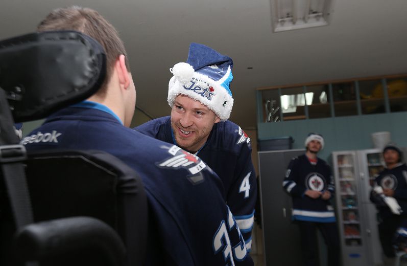 Winnipeg Jets spread some holiday cheer with visit to Rehabilitation ...