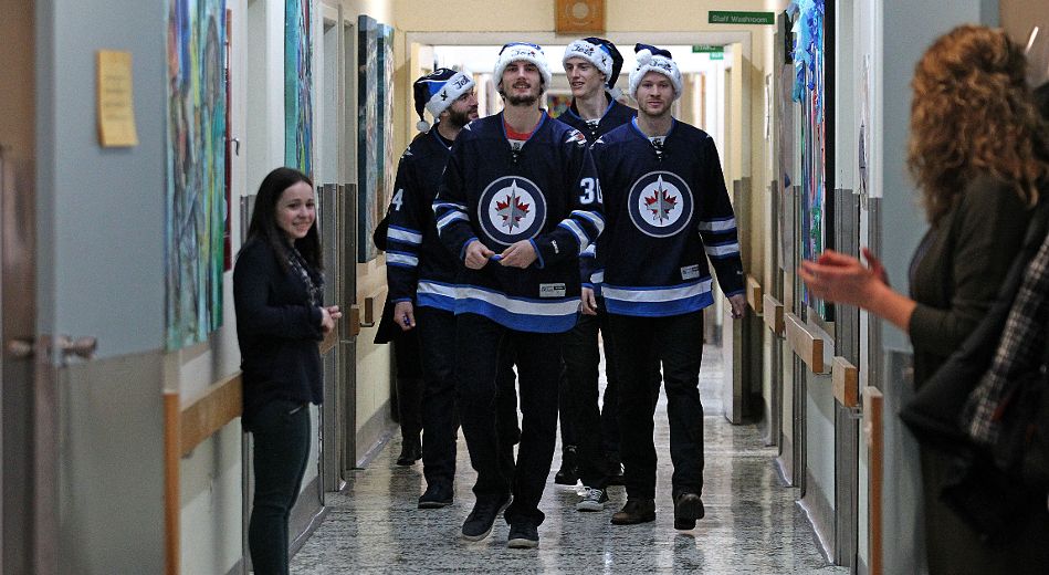 Winnipeg Jets spread some holiday cheer with visit to Rehabilitation ...