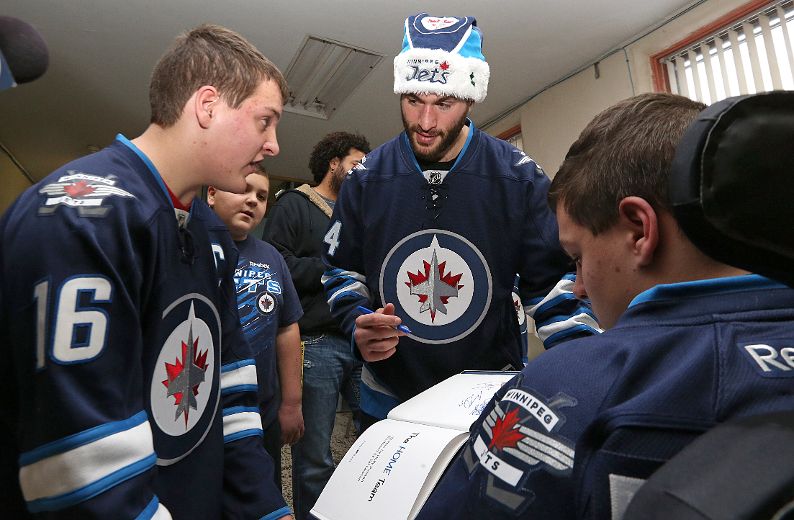 Winnipeg Jets spread some holiday cheer with visit to Rehabilitation ...