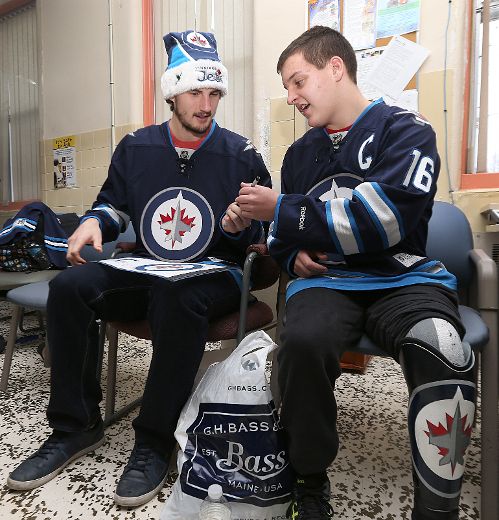 Winnipeg Jets spread some holiday cheer with visit to Rehabilitation ...
