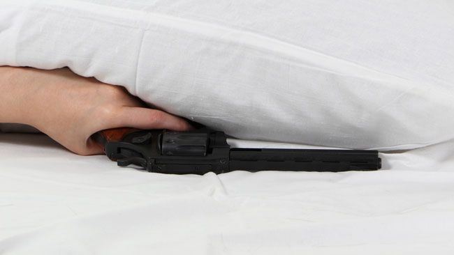 Police: Gun under pillow fires while woman sleeps, kills boy | Toronto Sun