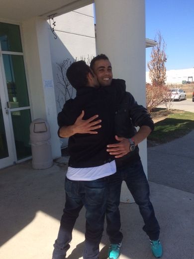 Interpreter James Akam reunites with brother | Toronto Sun