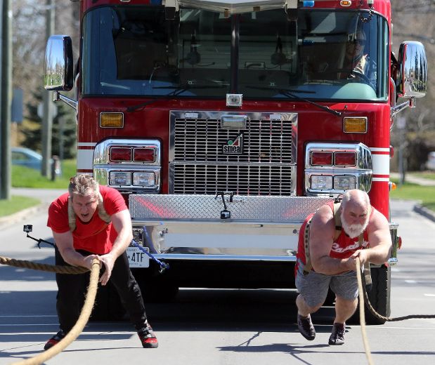 Ont. men pull 3 fire trucks, set Guinness World Record | Toronto Sun