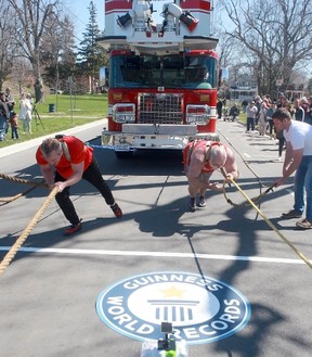 Ont. men pull 3 fire trucks, set Guinness World Record | Toronto Sun