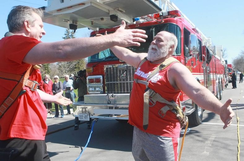 Ont. men pull 3 fire trucks, set Guinness World Record | Toronto Sun