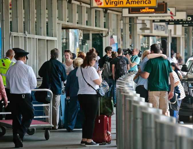 What to know about long lines at airport security | Toronto Sun