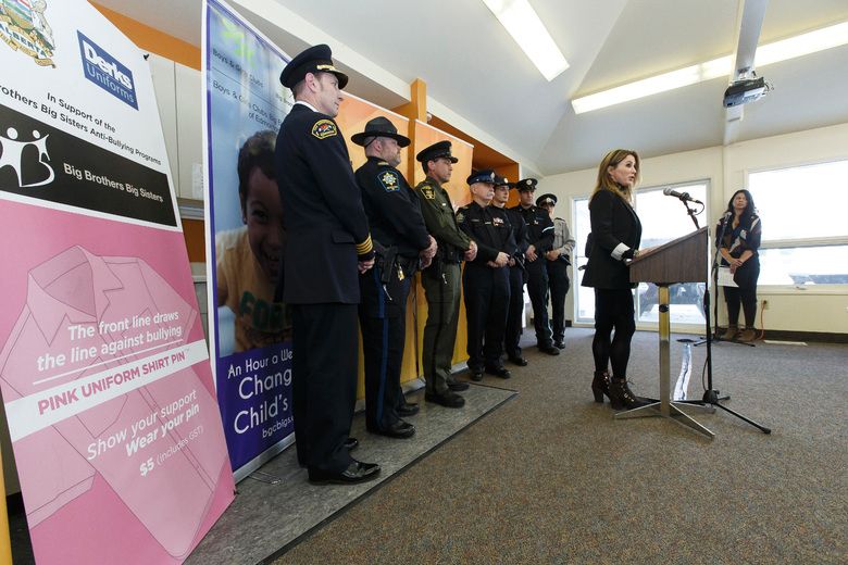 First responders wear pink pin to stand against bullying | Edmonton Sun