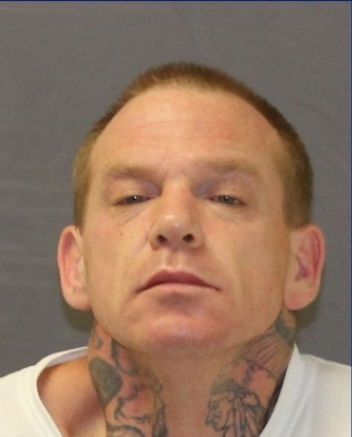 Dennis George, 46, is charged with attempted murder as a woman remains ...