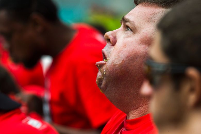 Good gravy! Poutine-eating contestants race to the bottom of the fries ...