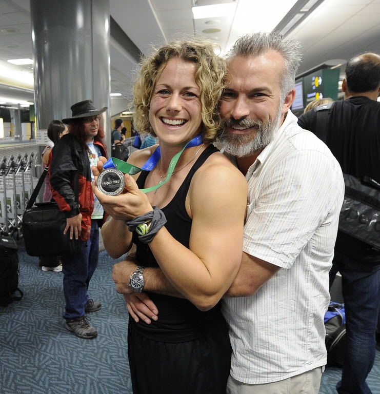 Canadian rugby star Andrea Burk receives hero's welcome at YVR ...