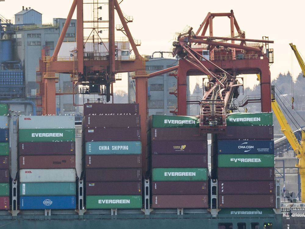 Crane crashes down on container ship at Port of Vancouver | Vancouver Sun