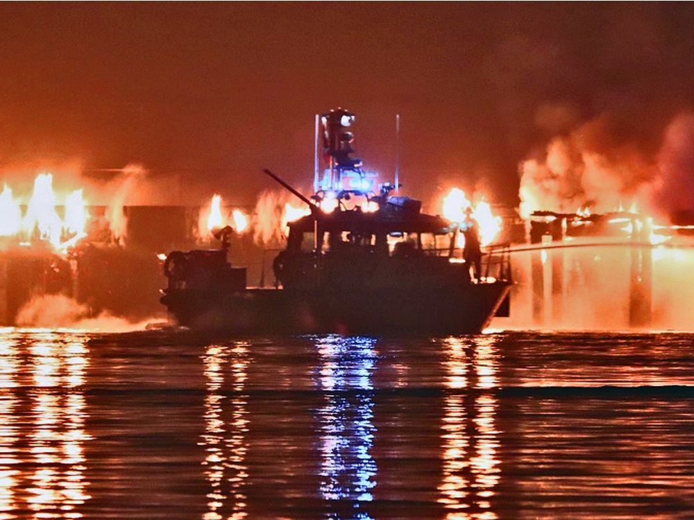 Large fire erupts on the Fraser River dock | Vancouver Sun