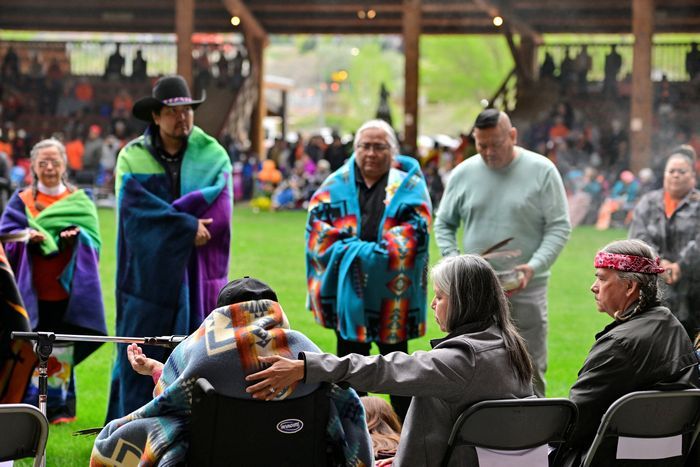 Photos: Memorial marks anniversary of unmarked grave discovery in ...