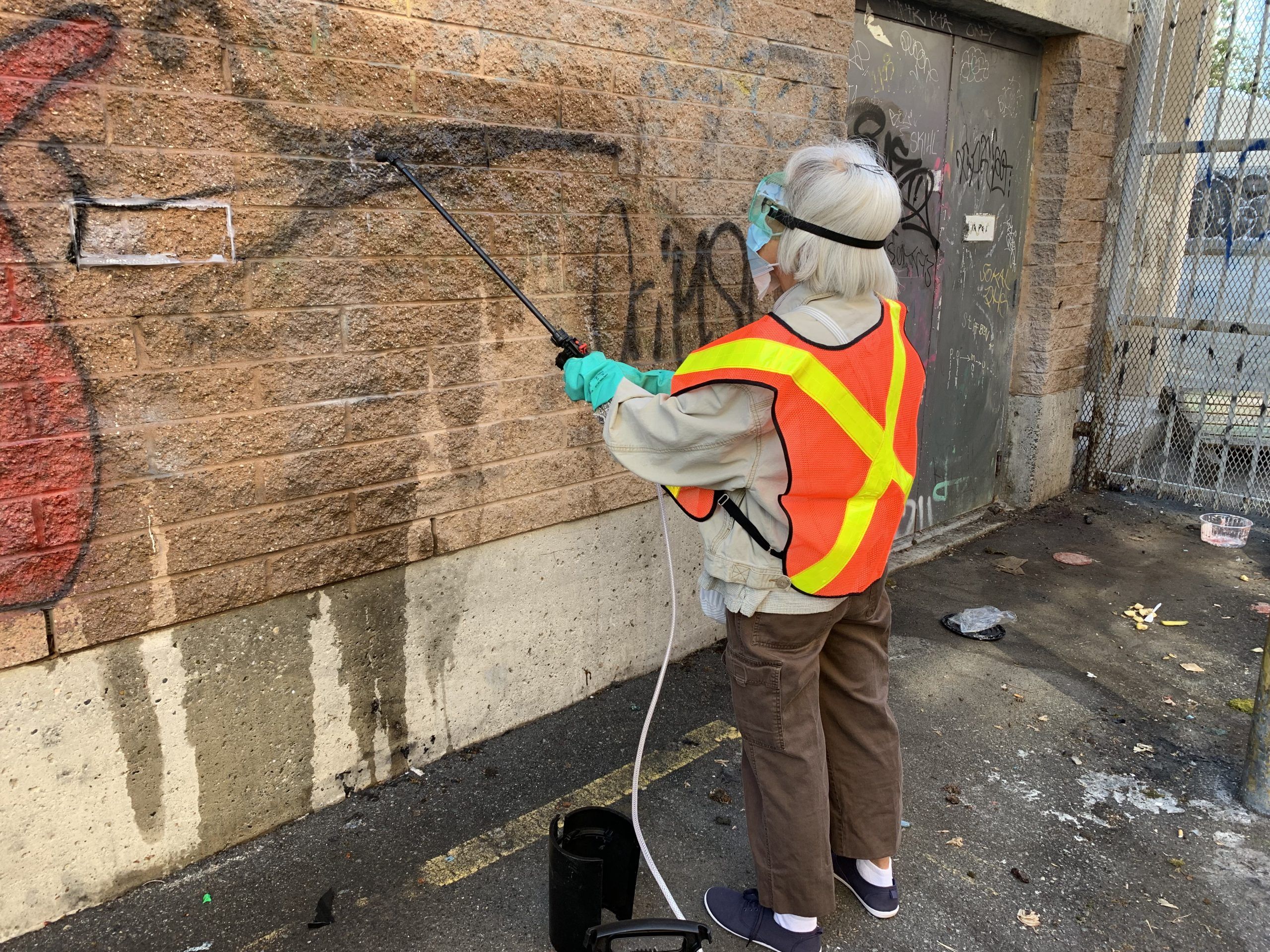 Volunteers out in force to clean up graffiti in Vancouver's Chinatown ...