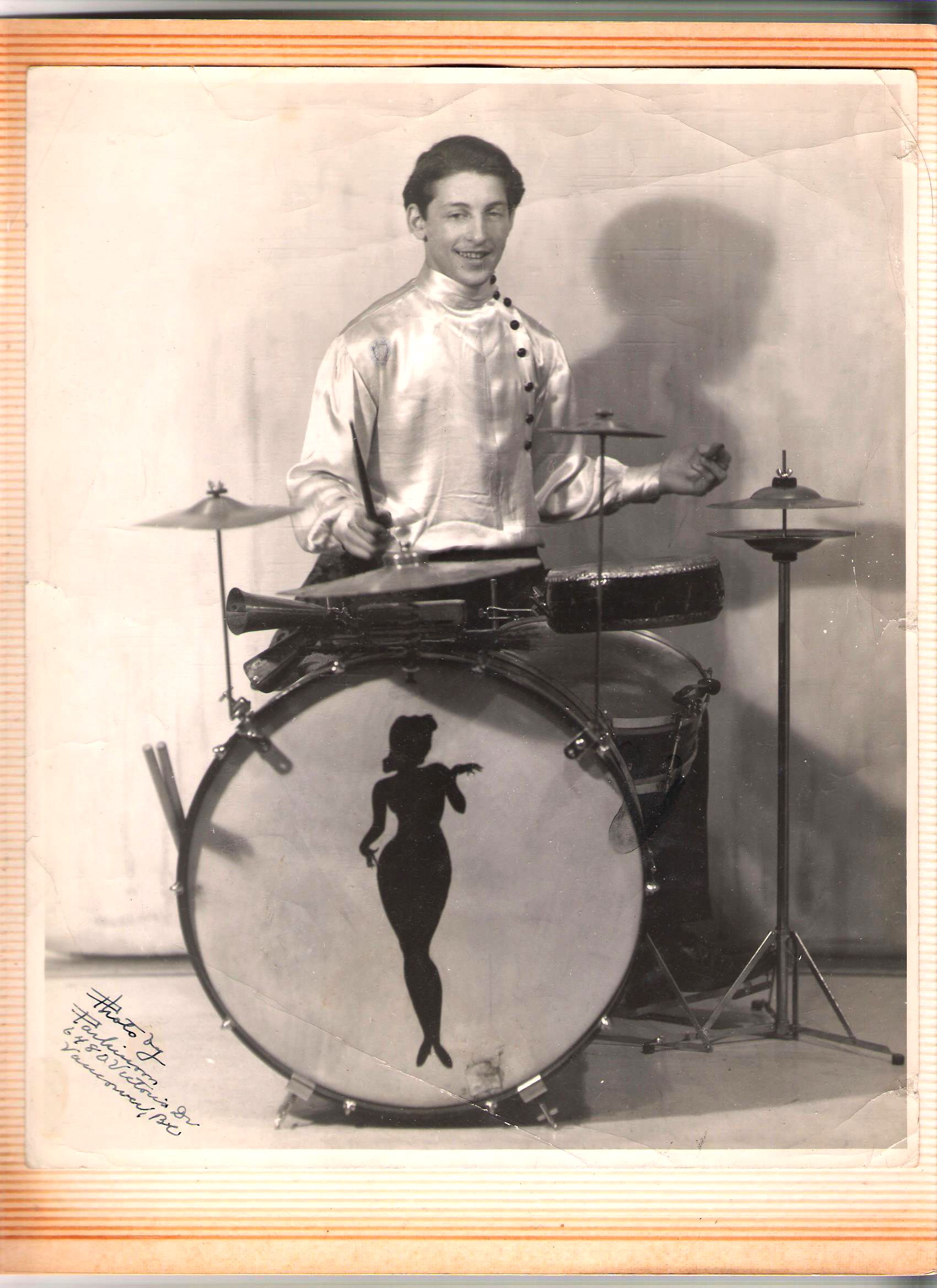 A drummer leaps off the stage to shield his pregnant wife from a ...